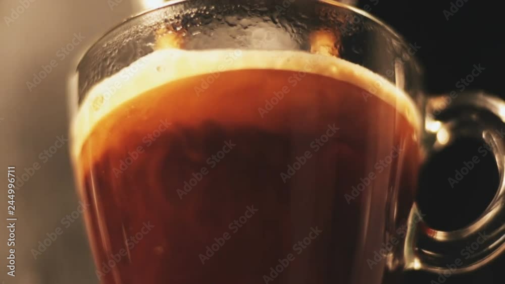 Process of making Americano coffee machine, mixing two liquids: water ...