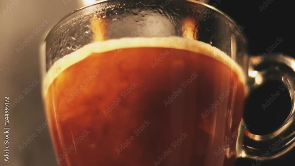 Process of making Americano coffee machine, mixing two liquids: water ...