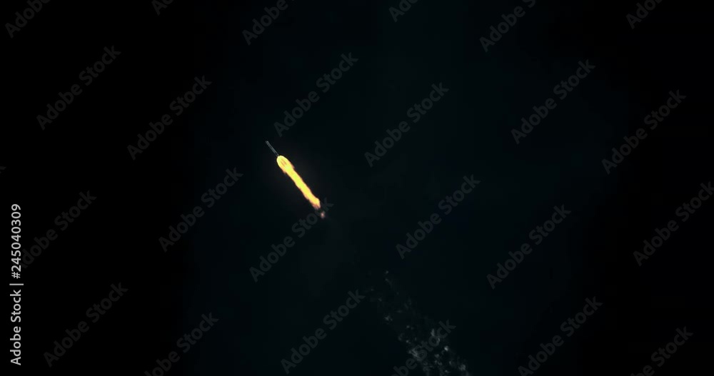 ICBM nuclear missile rocket flying in space with bright yellow exhaust ...