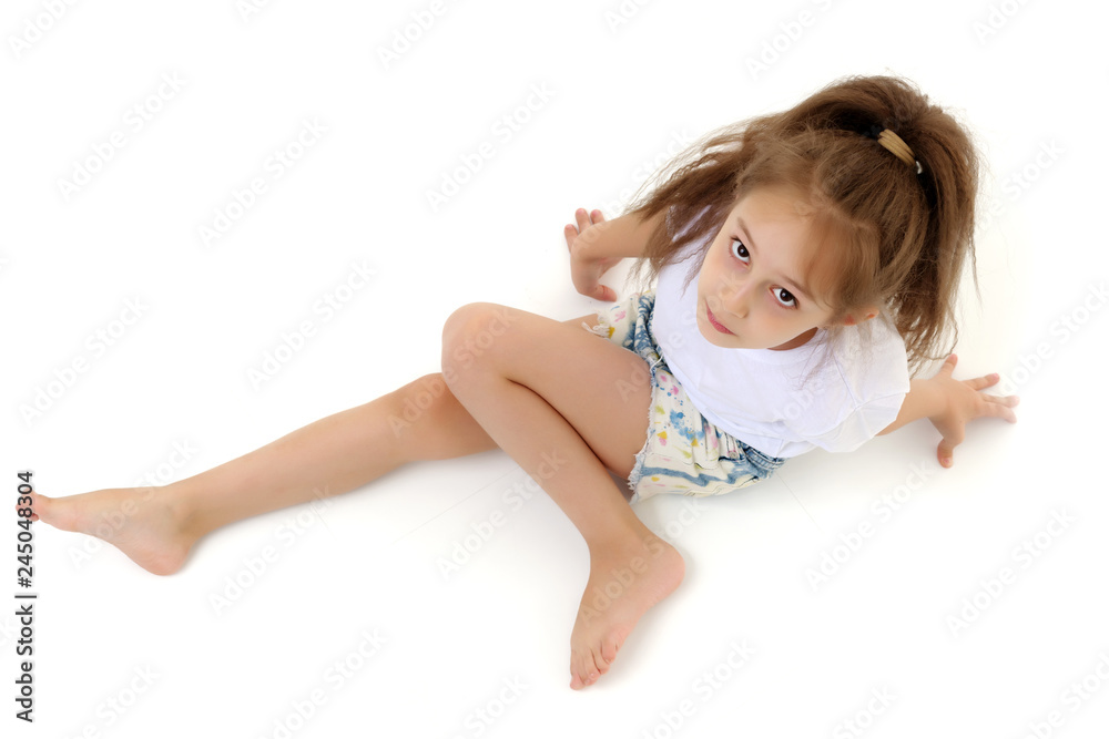 Beautiful little girl view from above. Stock Photo | Adobe Stock