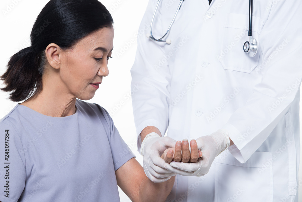 Asian Middle 60s age Woman Patient check up health with Doctor. Aging ...