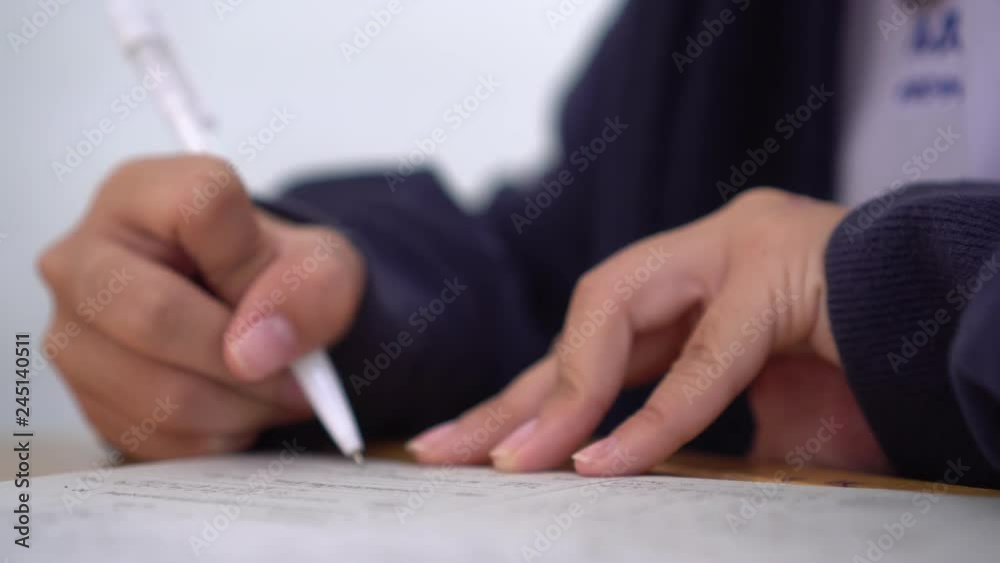 School / university Students hands taking exams, writing examination ...