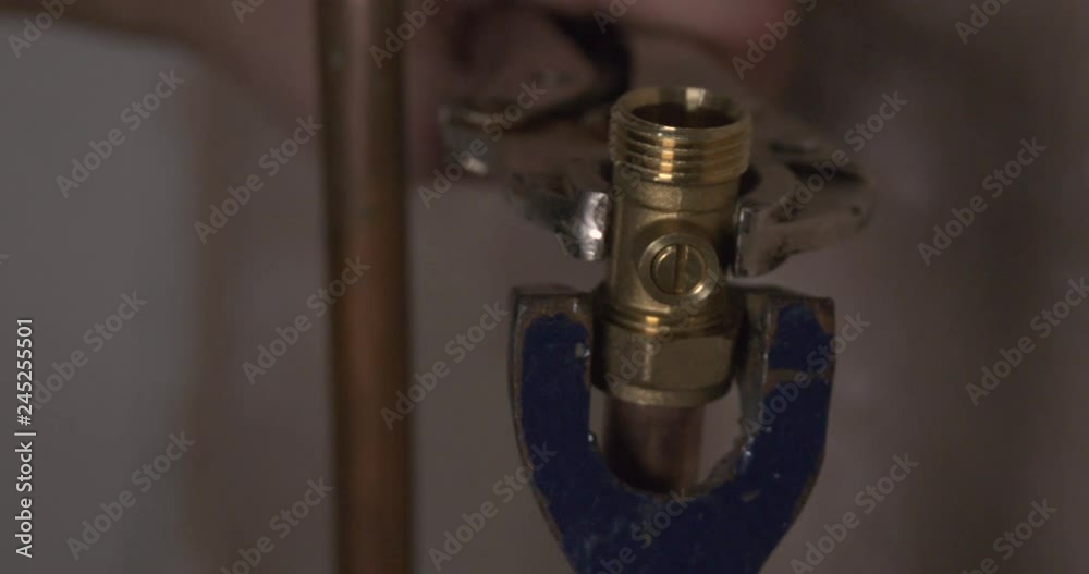 Connecting a valve on copper pipes when installing a new bathroom suite ...