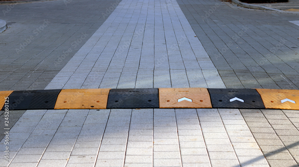 Install speed humps for safety Stock Photo | Adobe Stock