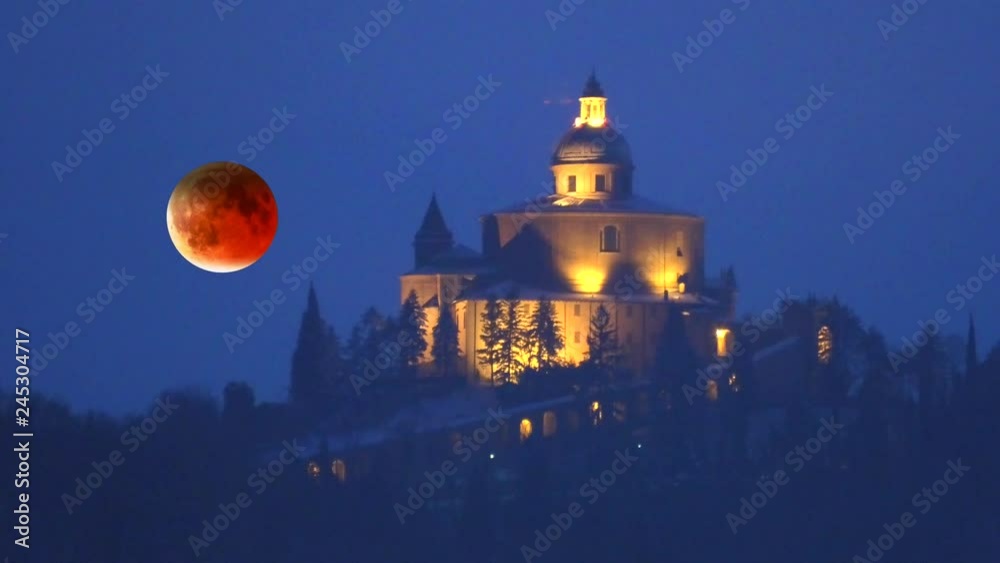 full red moon phases of the lunar eclipse with San Luca basilica church ...