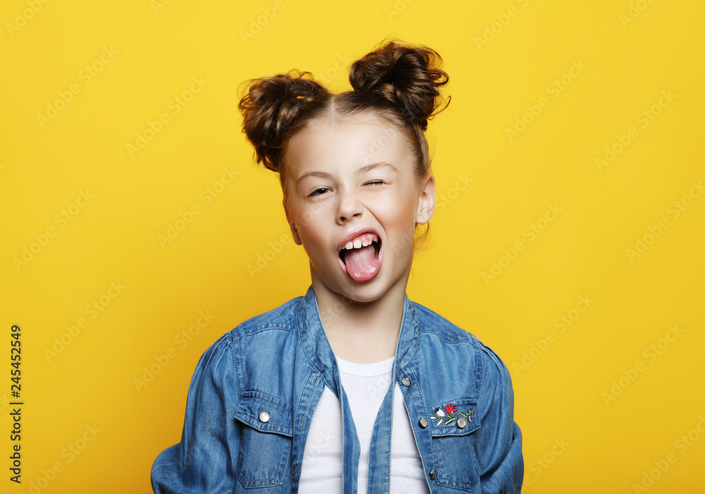 Portrait of little girl with opened mouth and crazy expression ...