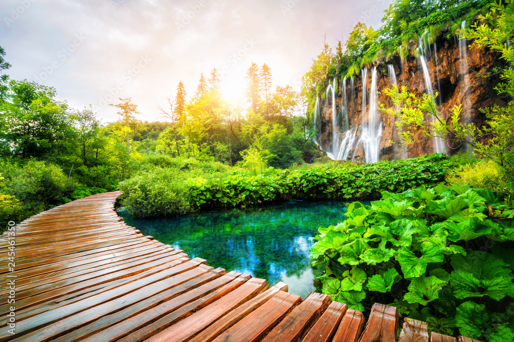 Beautiful wooden path trail for nature trekking with lakes and ...
