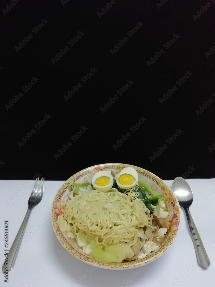 Traditional stir-fried Thai phat mama mie noodles with pork and ...
