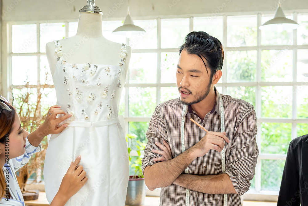 Young asian confident fashion designer-clothes women and team are ...