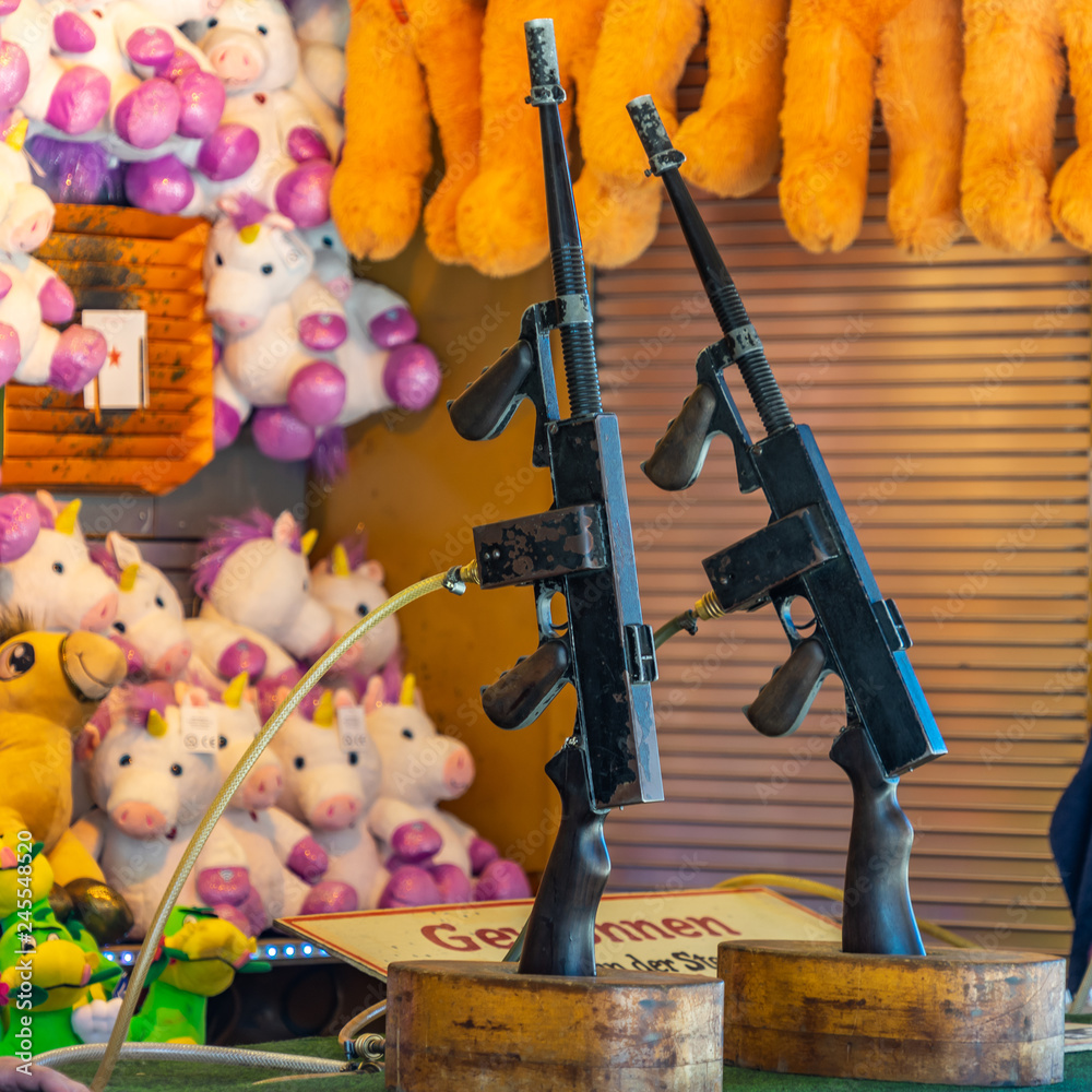 Air-operated assault rifles at a shooting range on a fairground Stock ...