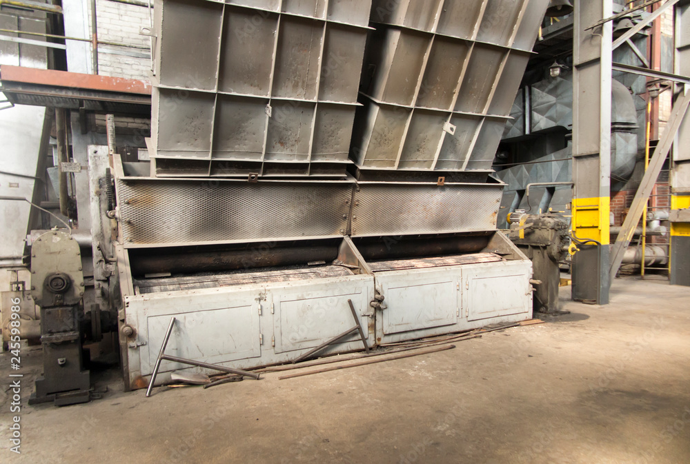 destroyed coal-fired boiler with a heavy brickwork and a double ...