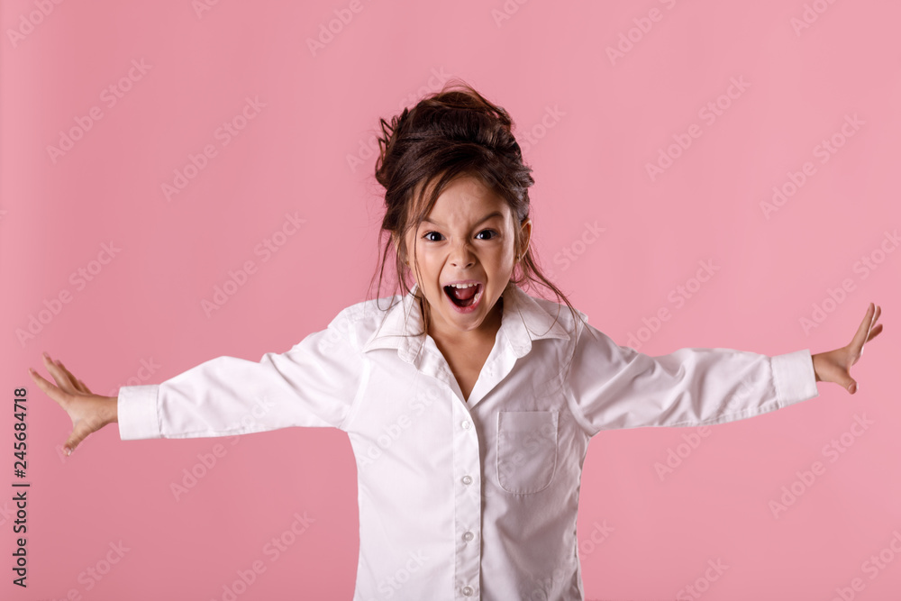 angry little child girl in white shirt with hairstyle Stock Photo ...