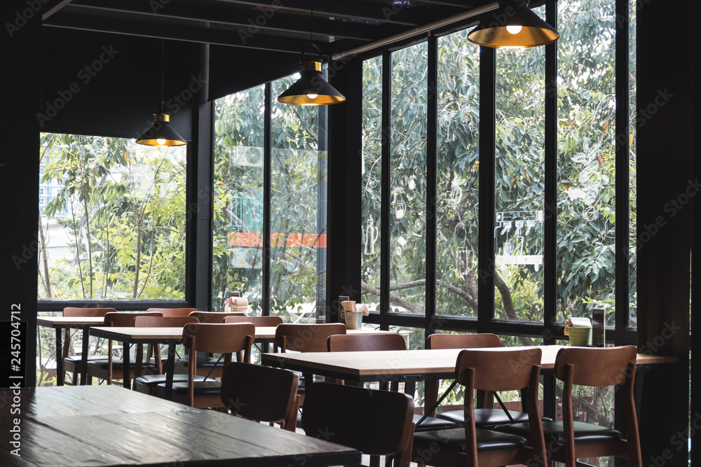 Table and chair set in modern cafe minimalistic interior design with ...