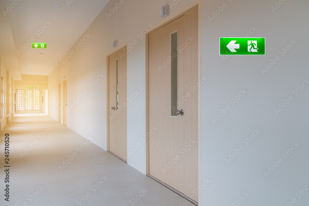 green emergency exit sign to install in new hospital building ...