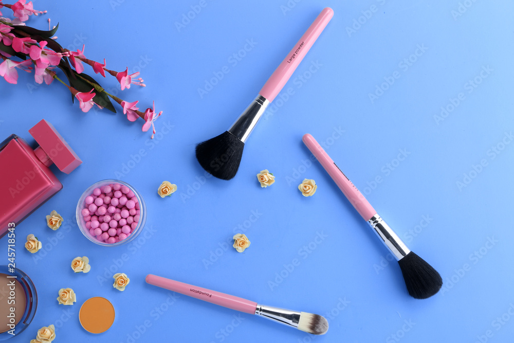 Beauty background with facial cosmetic products, leaves and cherry ...