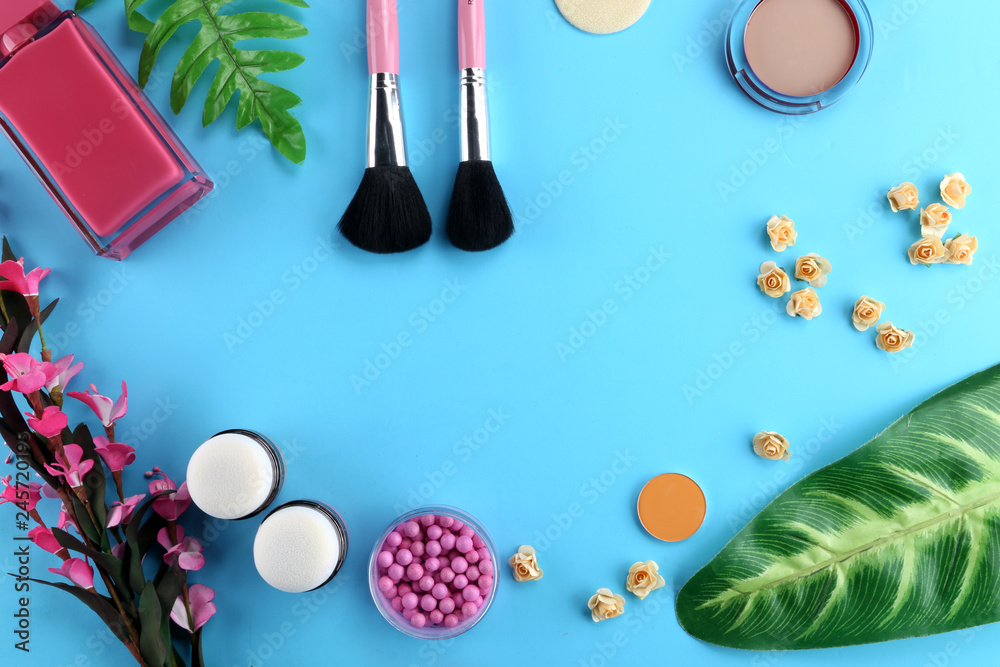 Beauty background with facial cosmetic products, leaves and cherry ...