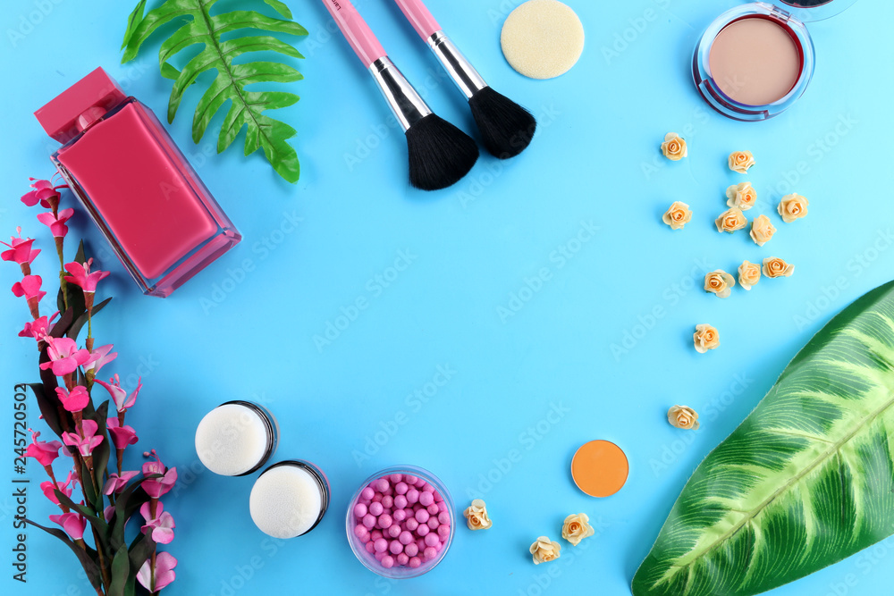 Beauty background with facial cosmetic products, leaves and cherry ...