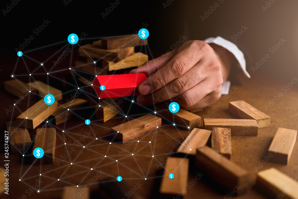 business financial ideas concept businessman hand build wood block with ...