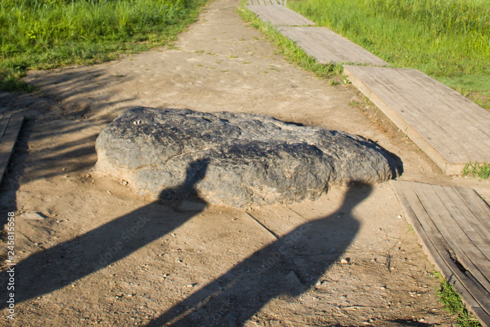 Meteorite. Natural anomaly. The famous meteorite lies on the shore of ...