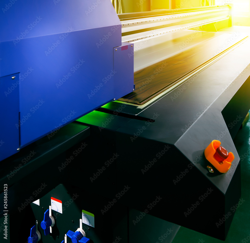 Large laser engraving and printing machine Stock Photo | Adobe Stock