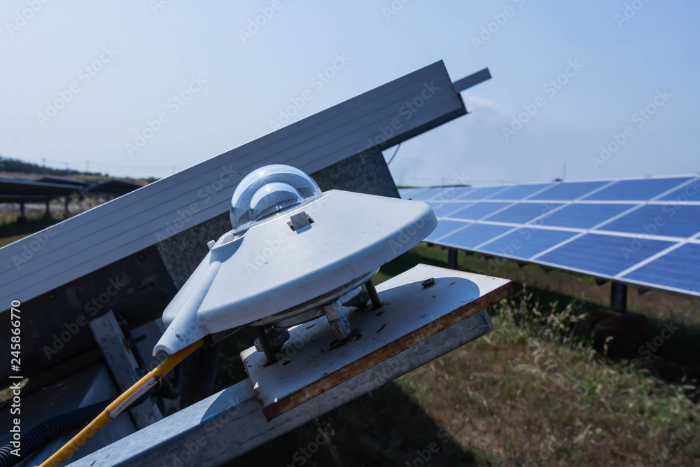 pyranometer for measuring irradiance in solar farm with blue sky Stock ...