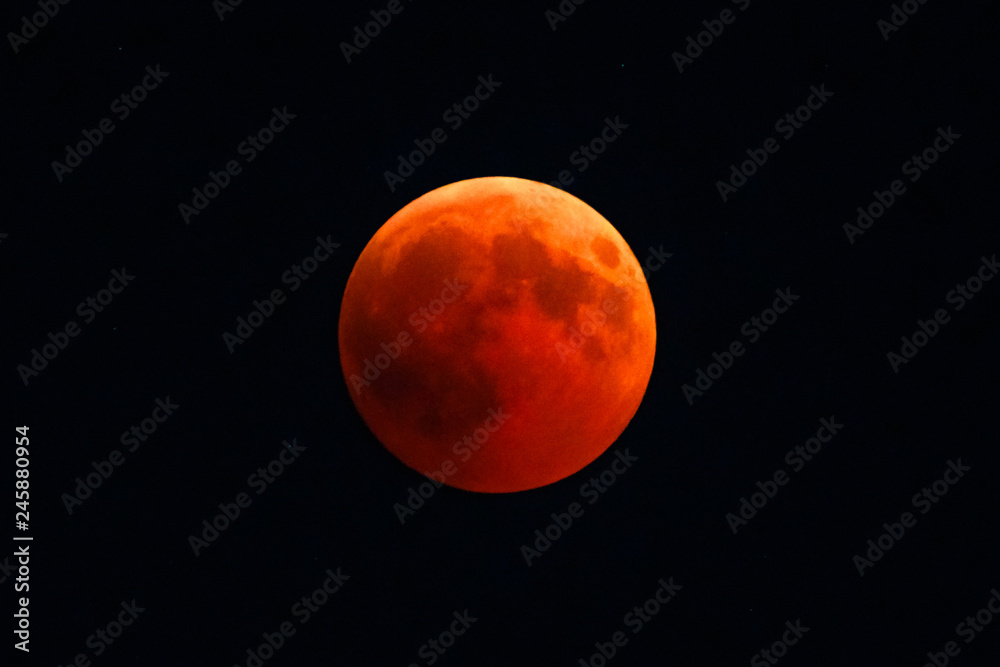 Full red moon by night. The moon turned red for Mars planet. Total ...