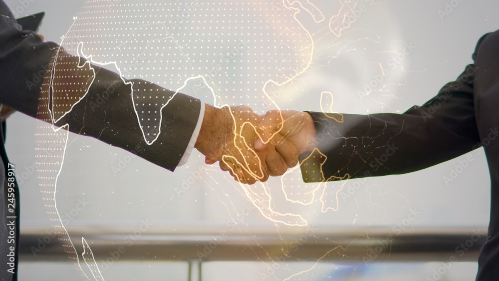 Handshake concept, handshake of two businessmen on the background of ...
