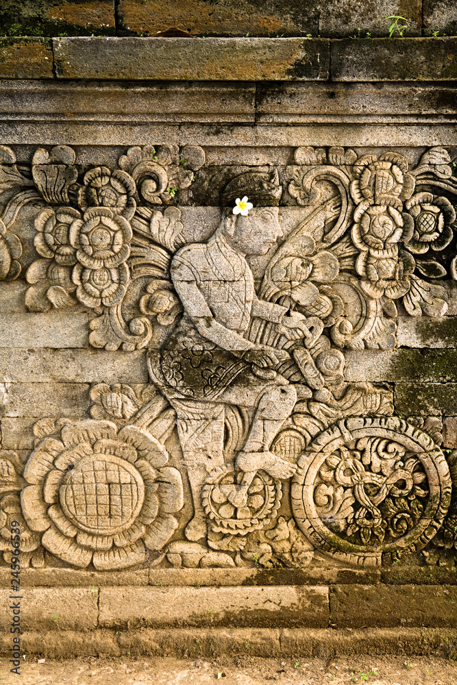 Foto de Image of bicycle rider during the Dutch colonial era carved ...