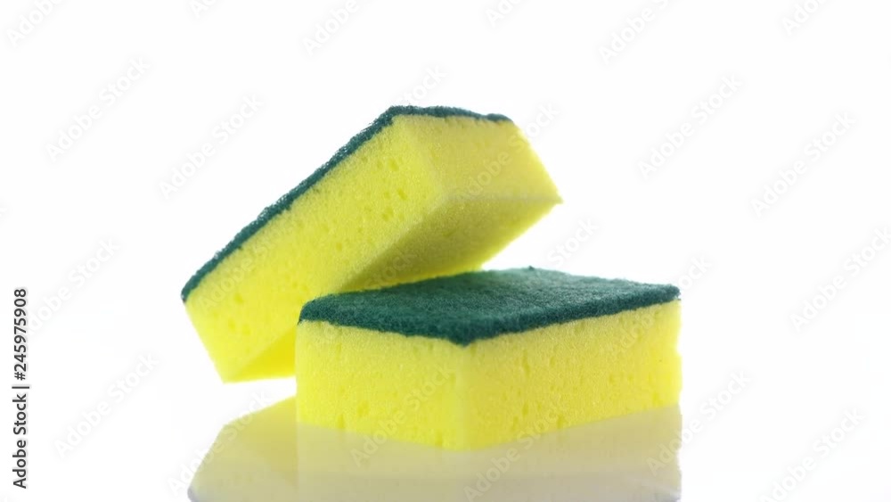 Cleaning sponge. Stack of cleaning sponges rotated on white background ...