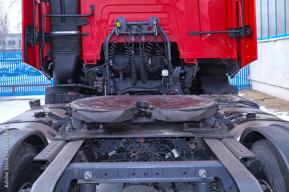 Rear of the tractor unit. Visible fifth wheel couplings are fitted to a ...