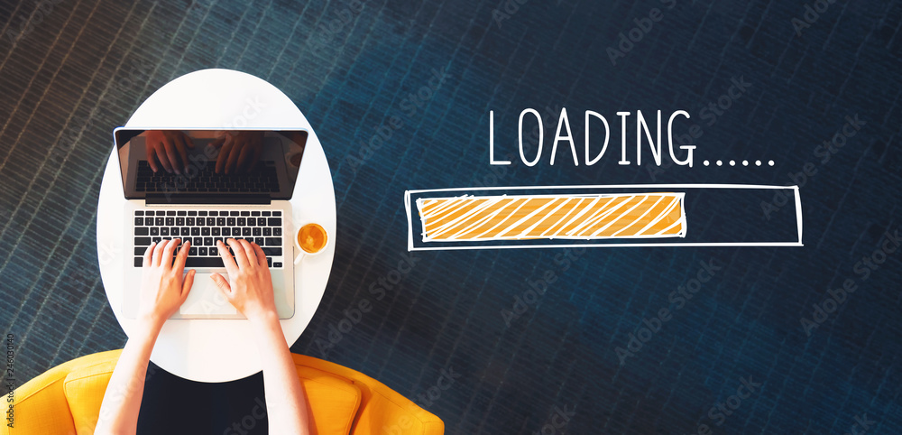 Loading concept with person using a laptop on a white table Stock Photo ...