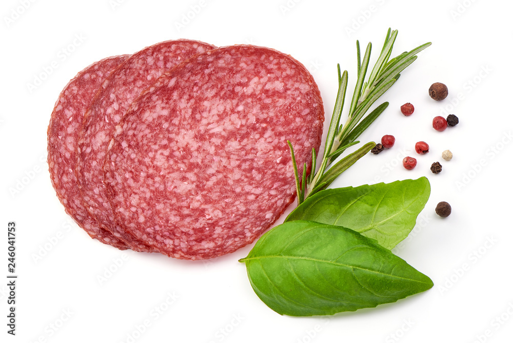 German Salami slices with herbs and peppercorns, top view, isolated on ...