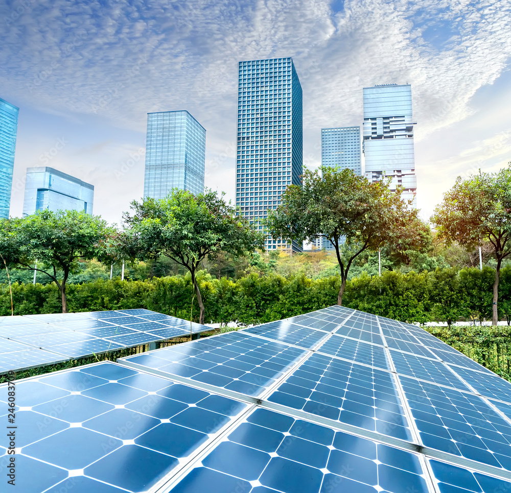 Ecological energy renewable solar panel plant with urban landscape ...