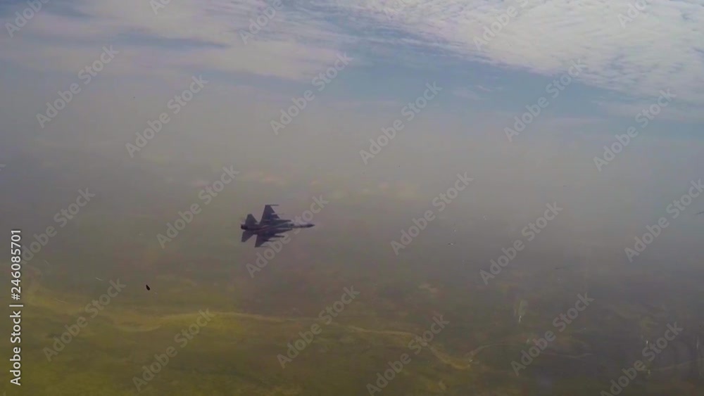 Fighter jet turning back in the sky, beautiful flying in blue sky and ...