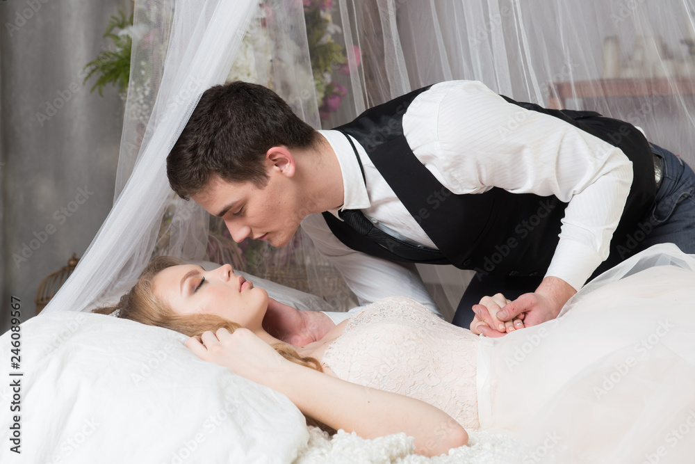 Sleeping fairy-tale Princess who wakes up from a kiss of a handsome ...