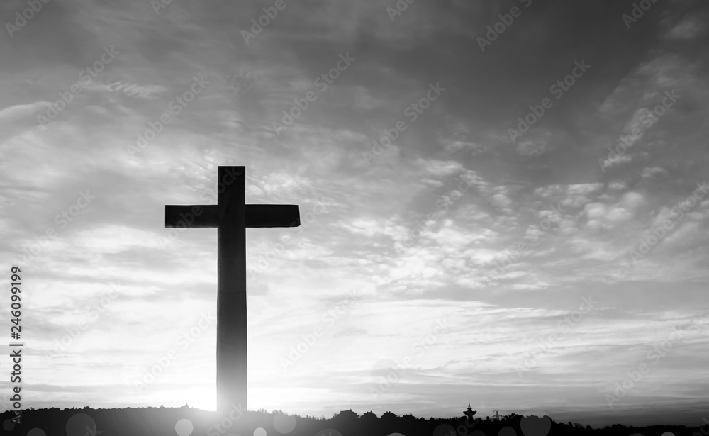 Concept of Jesus Christ: white cross on sunset sky background Stock ...