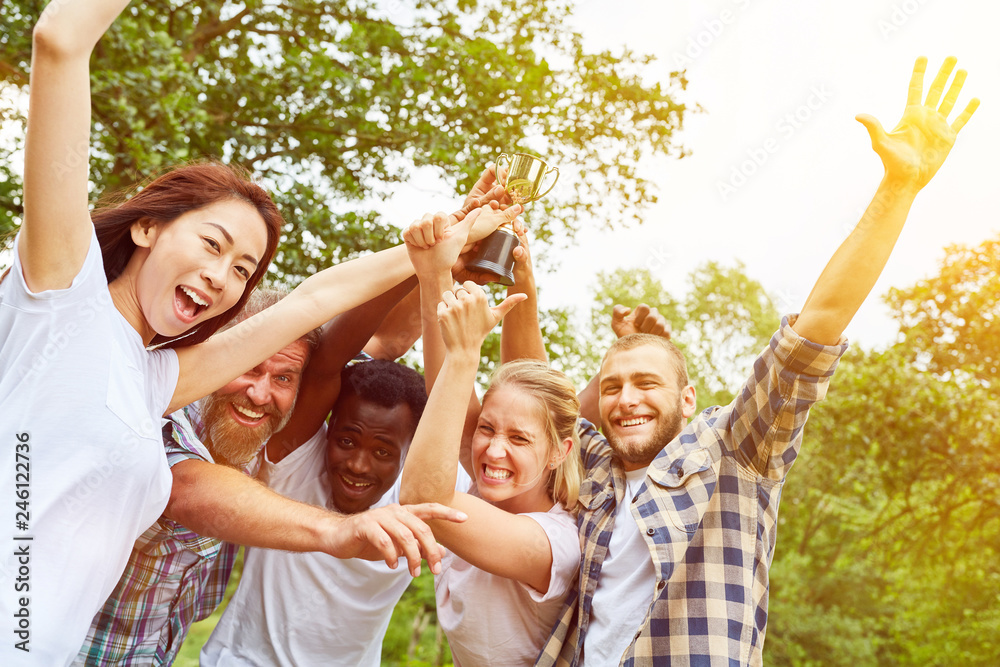 Sieger Team beim Jubeln mit Pokal Stock Photo | Adobe Stock