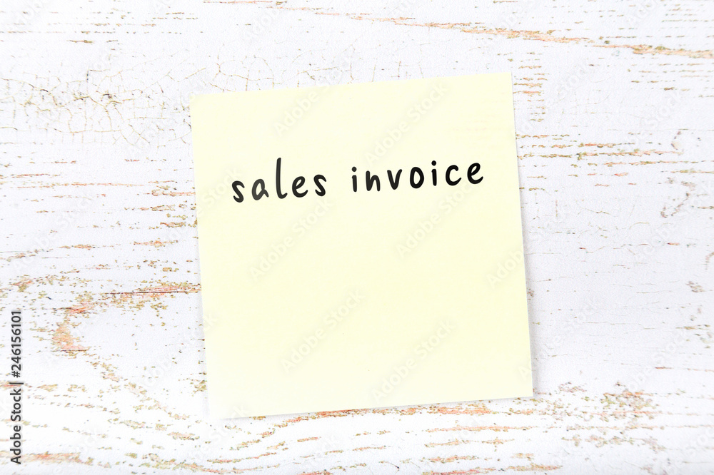 Yellow sticky note with handwritten text sales invoice Stock Photo ...