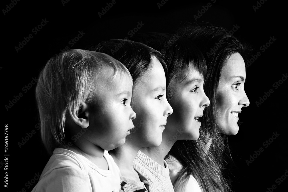 Family portrait of mother and three boys, profile picture of them all ...