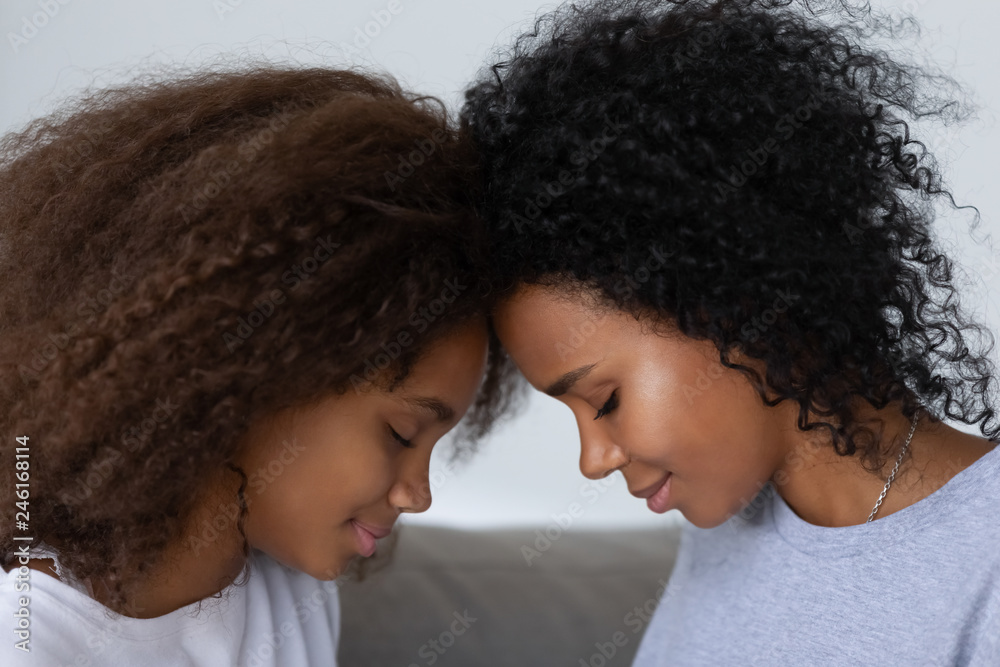 Loving African American Mom And Daughter Have Intimate Close Moment