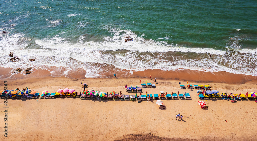 top view of beach in Goa India vagator beach. people taking sunbath on ...