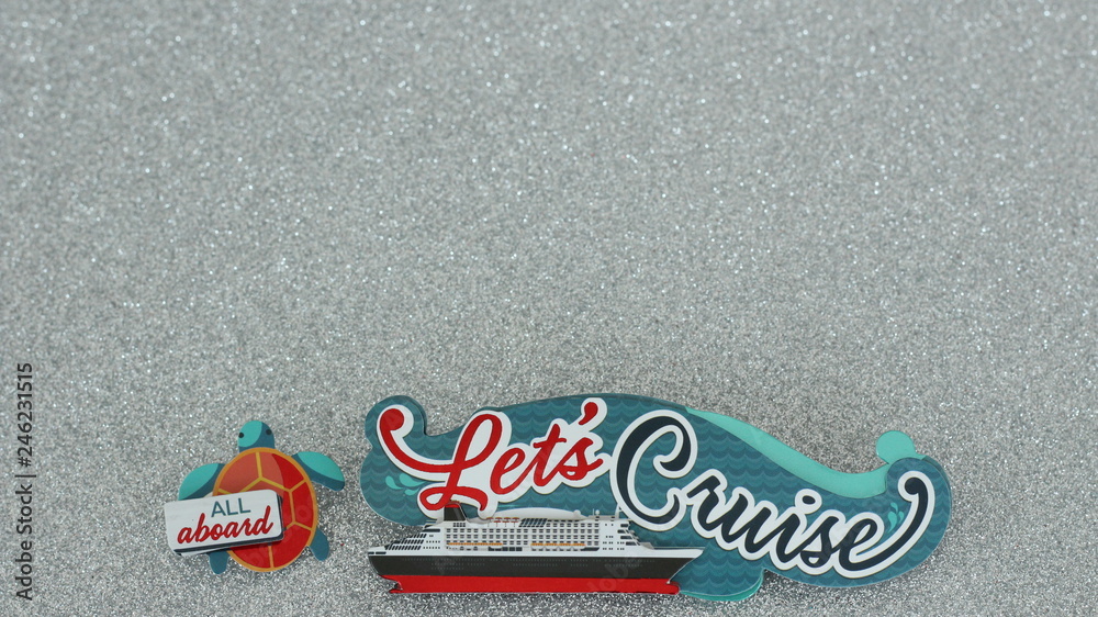lets cruise written on a banner with a cruise ship with dolphins turtle ...