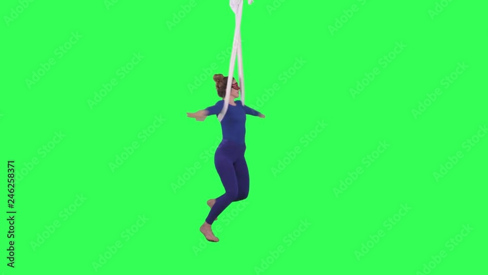 Vidéo Stock Acrobatic Tissue Artist spinning performs wearing a blue ...