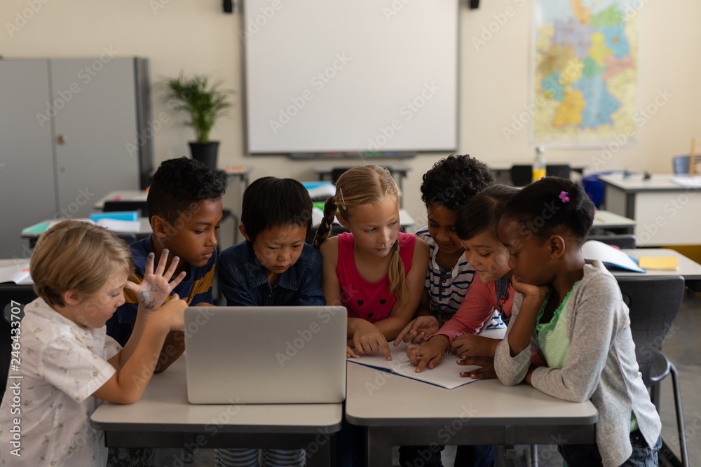 Group of school kids studying together in classroom Stock Photo | Adobe ...