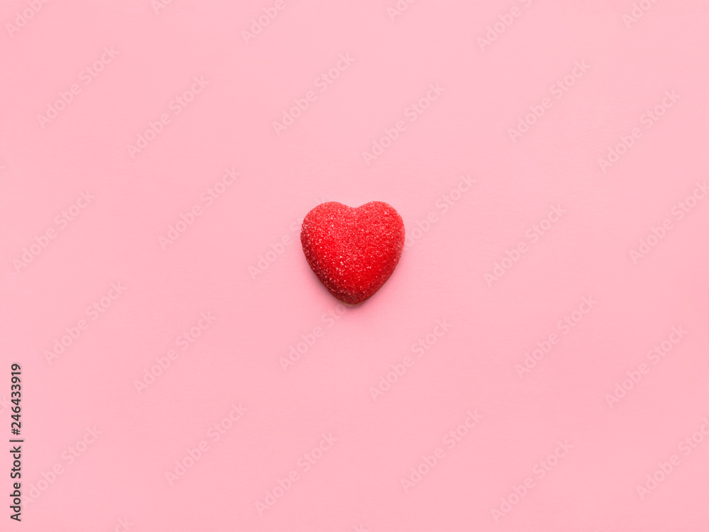 Candy heart Top view photo One sugar candy in the shape of a heart is ...