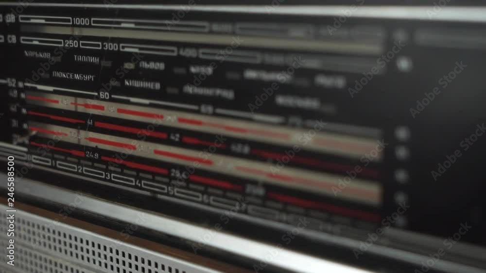 Old vintage radio being tuned by turning a dial. Stock Video | Adobe Stock