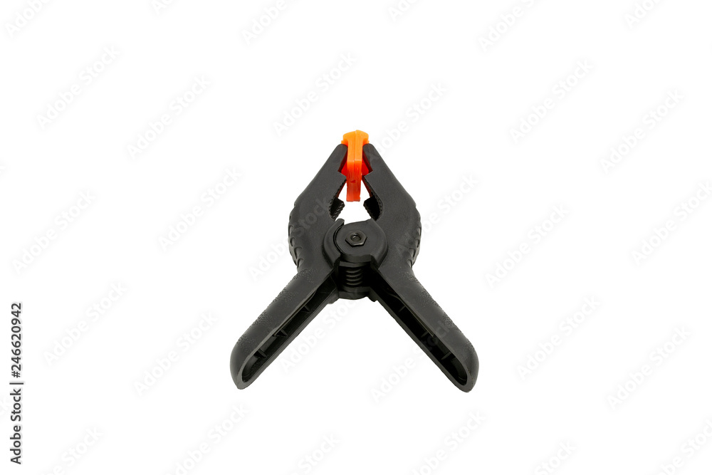 Black plastic spring clamp isolated on white background. Clamping tools ...