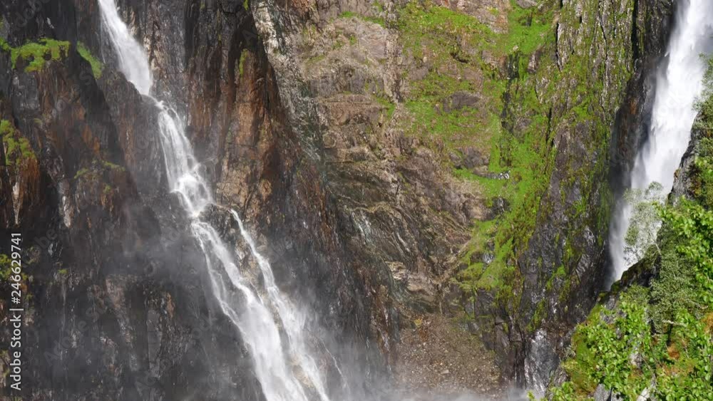 Voringsfossen waterfall in slow motion, green mountains, Mabodalen ...
