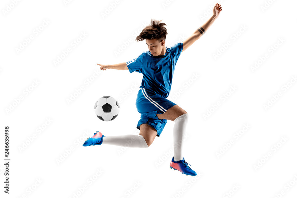 Young boy with soccer ball doing flying kick, isolated on white ...