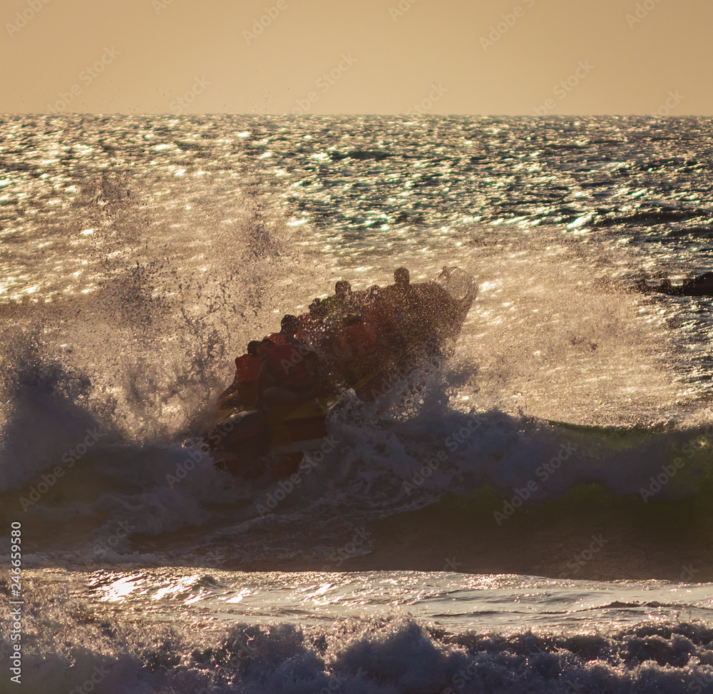 water sports in Goa India. Motorboat/ jetski or wave runner in action ...